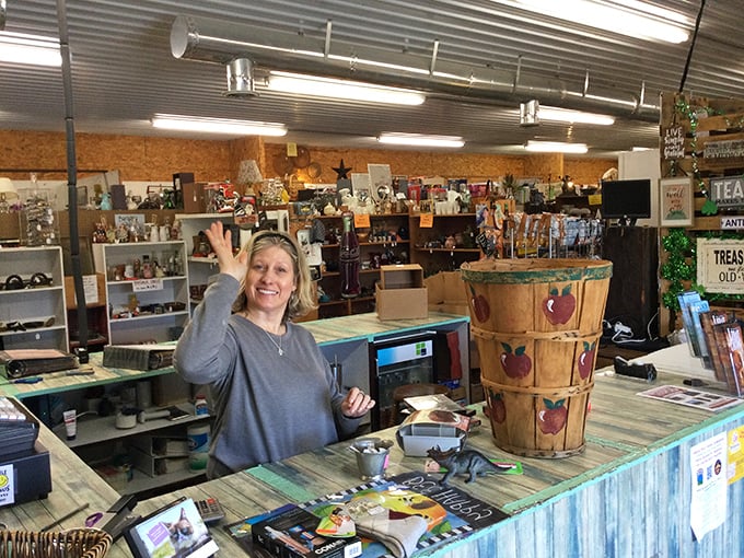 Every flea market has its welcoming ambassador, ready to share the stories behind the treasures. That smile says, "I know where all the good stuff is."