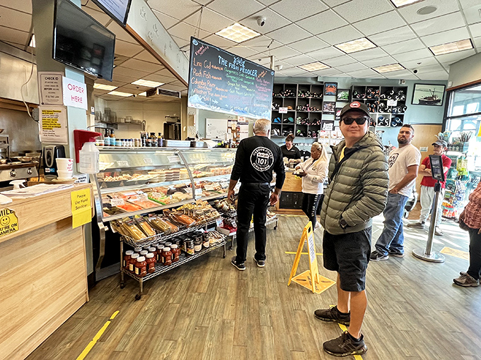 The line forms early at The Fish Peddler, where locals and visitors unite in the universal language of seafood appreciation.