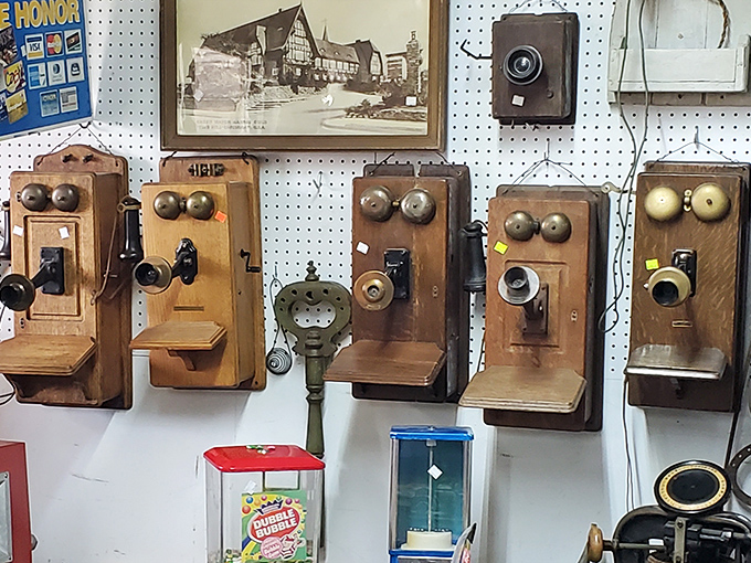 Before smartphones ruled our lives, these wooden sentinels connected us. Each antique telephone represents a time when calls were events and conversations weren't interrupted by notifications.