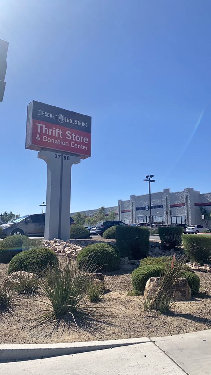The store's sign rises above the desert landscape, a North Star for the thrift-minded navigator.