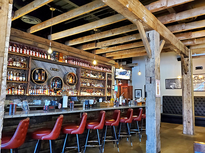 The bourbon bar showcases enough amber bottles to make a whiskey lover weep tears of joy into their smoked brisket.
