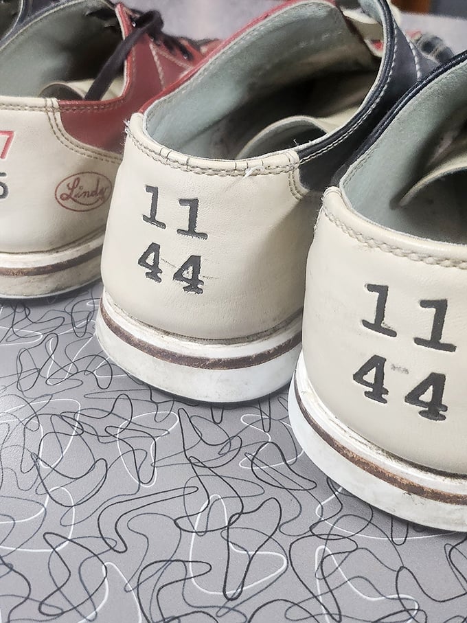 These weathered rental shoes have walked miles without going anywhere, carrying bowlers of all skill levels through countless frames of frustration and glory.
