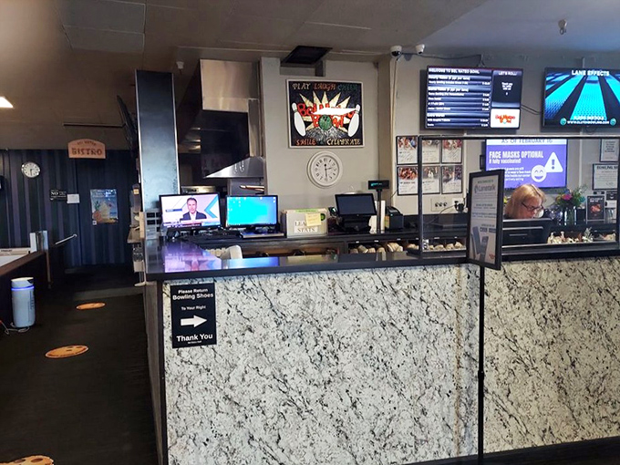 Command central: Where rental shoes are dispensed, lanes are assigned, and the occasional "Happy Birthday" announcement crackles through speakers.