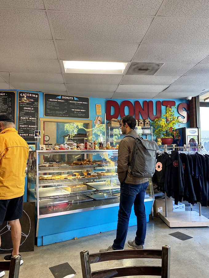 The moment of truth &ndash; a customer contemplates life's most important question: which donut personality matches today's mood?