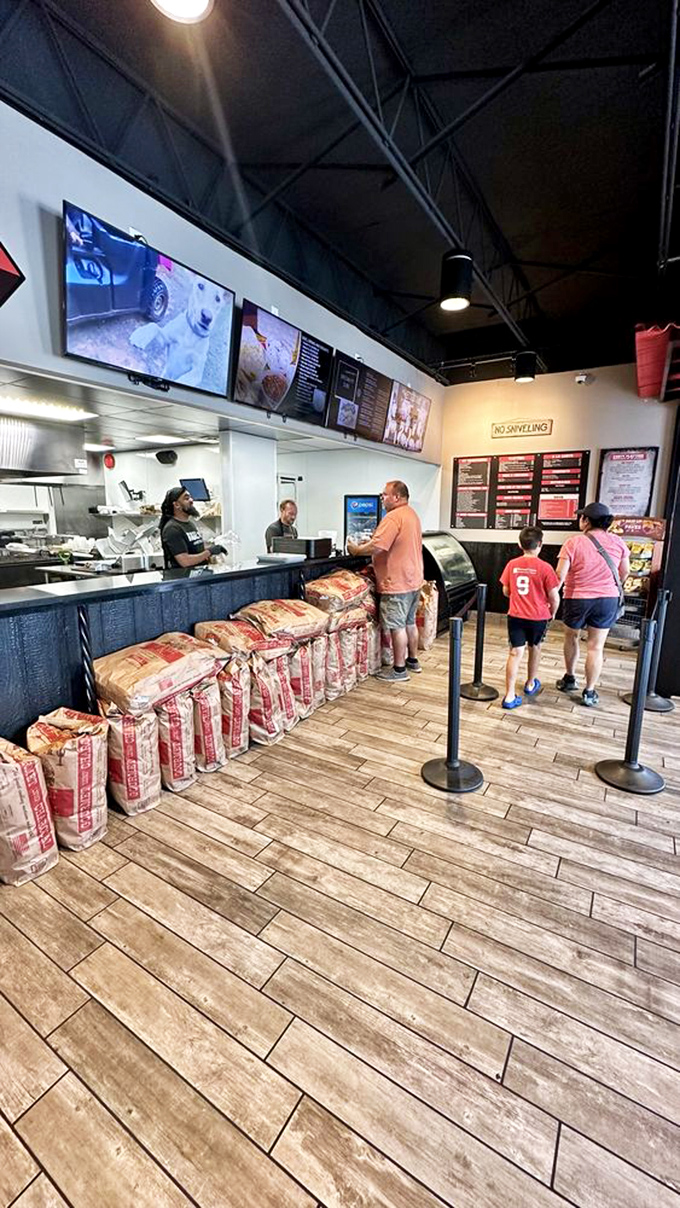 The pilgrimage to the counter&mdash;where hungry patrons await their turn at the altar of pit beef with the patience of saints.