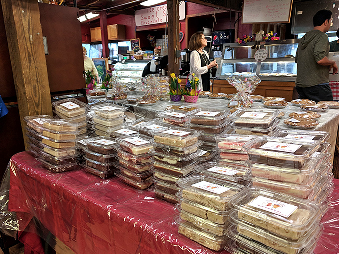 The bakery counter—where strangers become friends united by the universal language of "I'll take one of everything, please."