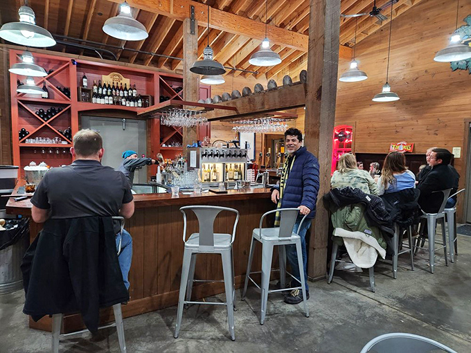 The bar scene at Tin Mill offers that perfect blend of conviviality and craftsmanship, where strangers become friends over local brews.