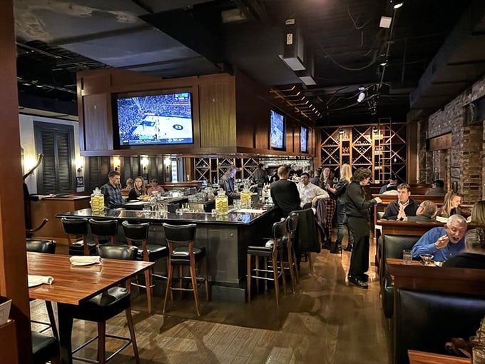 The bar area: where strangers become friends and friends become family. Sports on TV, drinks in hand&mdash;civilization at its finest.