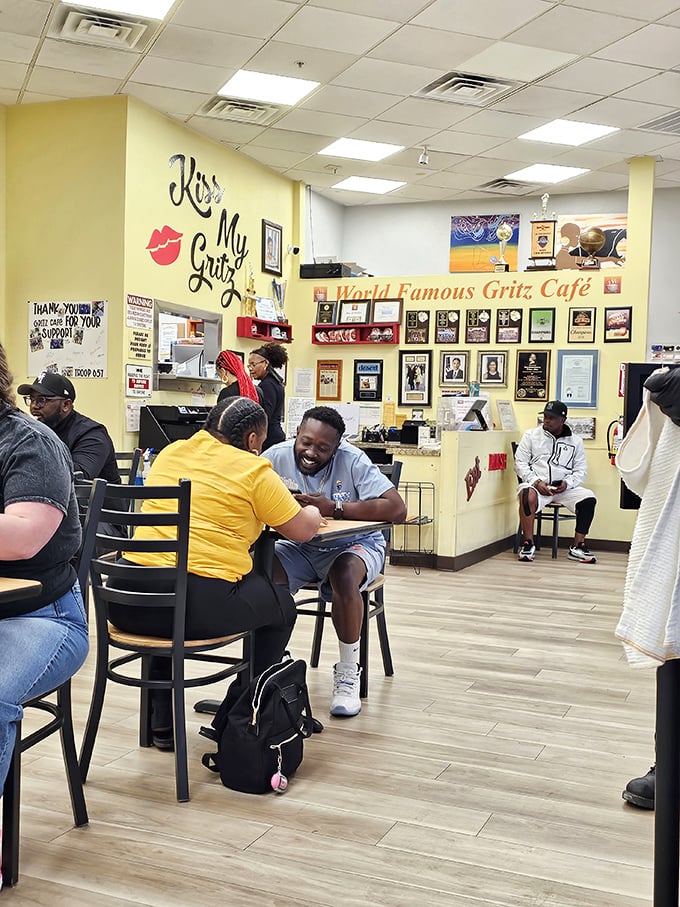 The bustling interior captures that magical moment when strangers become temporary family, united by the universal language of good food.