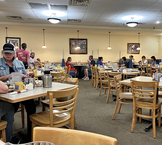 Every table tells a story at Kate's Kitchen, where strangers become neighbors united by the universal language of "pass the hot sauce, please."