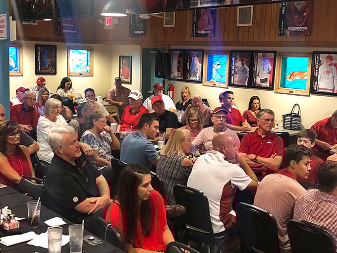 When Arkansas gathers for a meal, it's not just about the food&mdash;it's a community meeting with fried catfish as the agenda.