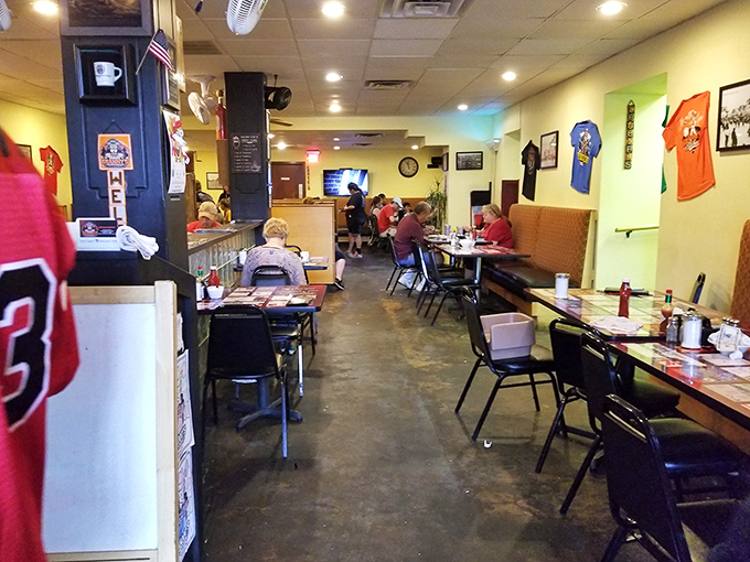 The dining room hums with conversation and silverware symphonies, where OSU memorabilia watches over breakfast rituals like old friends.