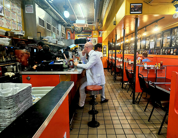 The counter seating isn't about aesthetics&mdash;it's about community. Where strangers become friends over coffee refills and political debates.