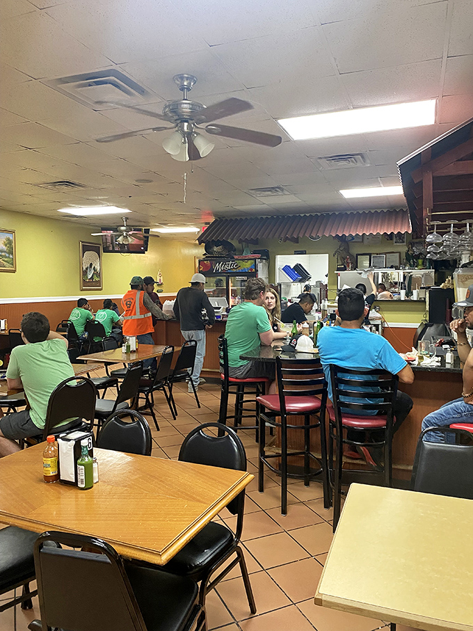 A dining room filled with people who know the secret: amazing food doesn't need fancy surroundings, just honest cooking and hungry customers.