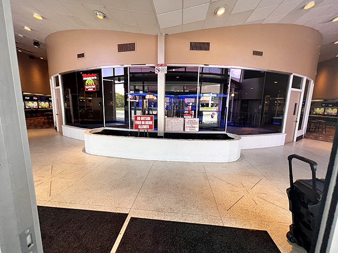 The curved entrance welcomes visitors with mid-century modern flair &ndash; a portal to bowling joy that hasn't changed its welcoming smile since 1959.