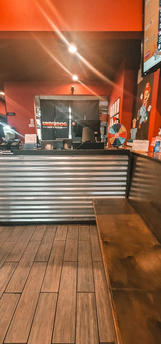 Underdog's iconic signage glows like a North Star for those wandering Boston's streets in search of Nashville-inspired spicy salvation.