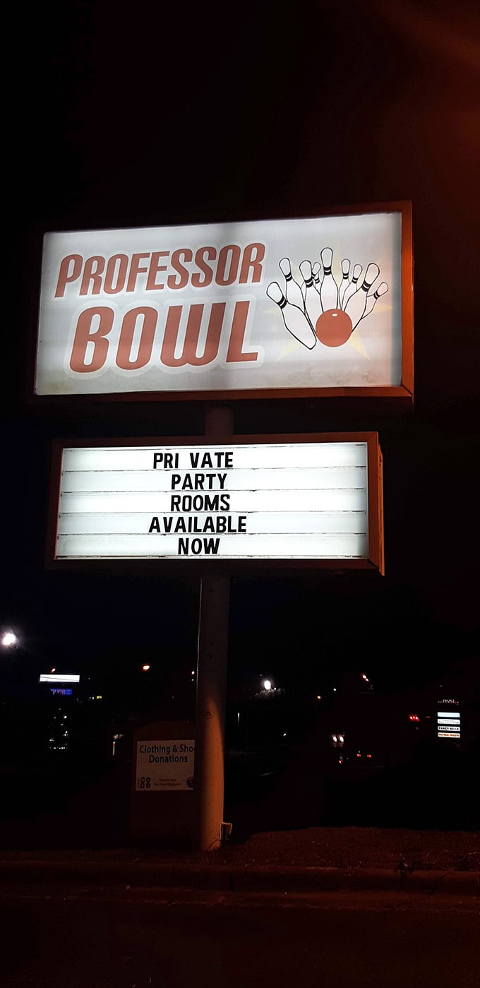 The vintage sign glows like a beacon in the night, promising private party rooms and the timeless joy of knocking things down for fun.