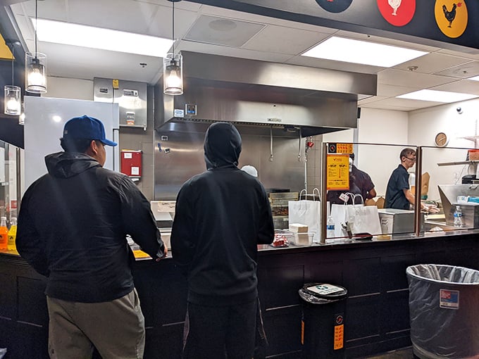 The kitchen crew works with the focused precision of neurosurgeons. Behind every great chicken strip is a team that understands the serious business of deliciousness.
