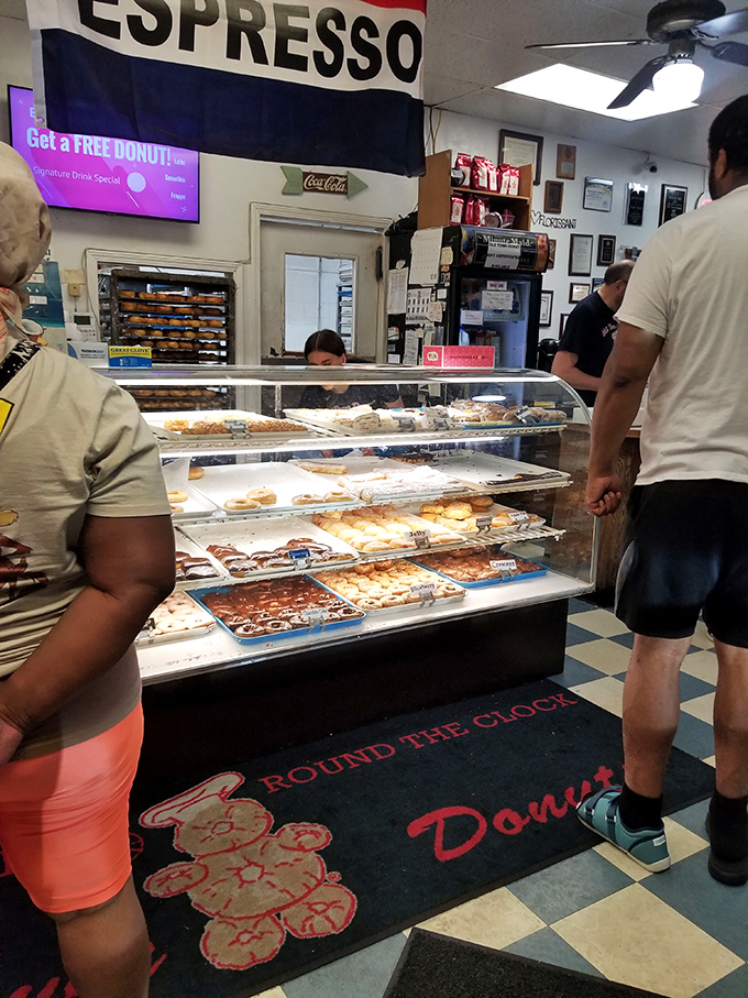 The "Round the Clock Donuts" mat isn't just floor decoration&mdash;it's a promise that your 3 AM sugar cravings will never go unanswered.