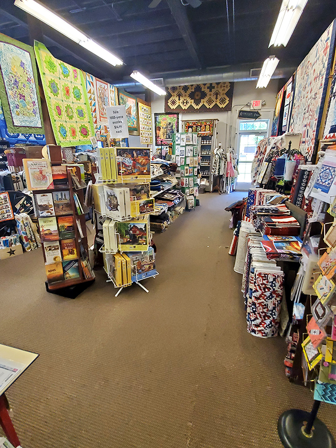 Navigation requires strategy in this fabric labyrinth. The shop maximizes every inch of space while maintaining an inviting atmosphere for browsing.