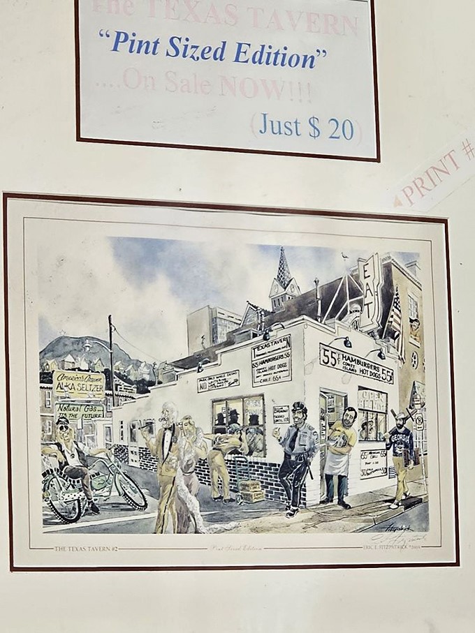 Framed artwork captures the tavern's place in local history. When your restaurant becomes the subject of commemorative art, you know you've made it.