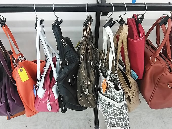 Handbag heaven hanging in a colorful chorus line. That leopard print tote is practically screaming "Take me home!"