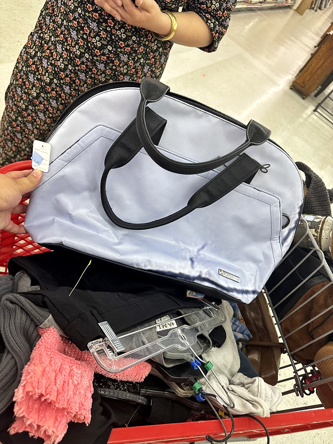 The thrill of the hunt captured in a single moment. That powder blue duffel bag represents someone's future gym companion or weekend getaway essential. 