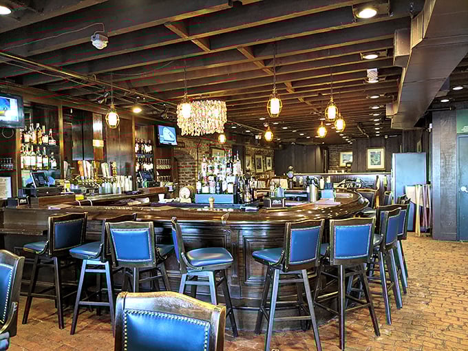 The bar area beckons with blue leather stools and warm wood tones&mdash;a perfect perch for pre-dinner drinks or post-meal storytelling.
