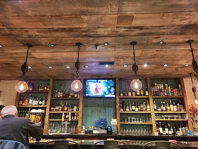 Behind the bar, spirits stand at attention like sailors, ready to complement your seafood feast with cocktails worthy of maritime celebration.