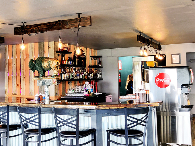 A bar that understands the importance of proper lighting and proper bourbon. Those Edison bulbs aren't just illuminating the space&mdash;they're setting the mood for meat appreciation.