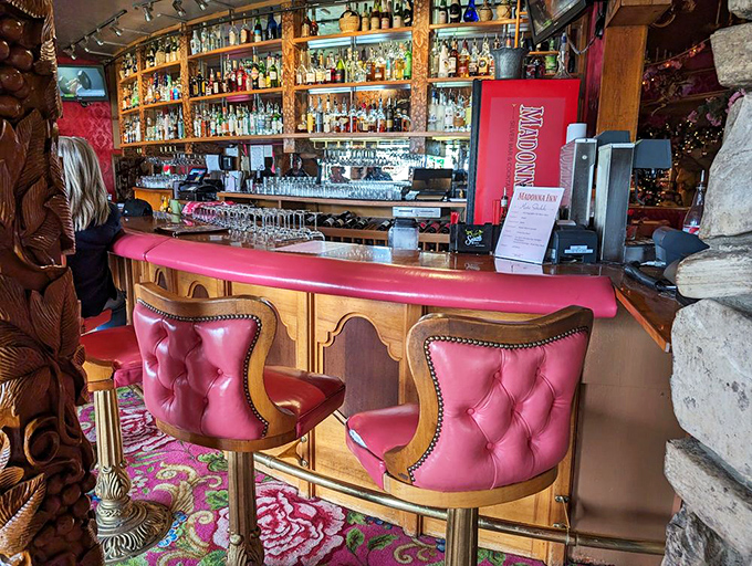 The bar area looks like it was designed by someone who said "more pink" at least 37 times during planning meetings.