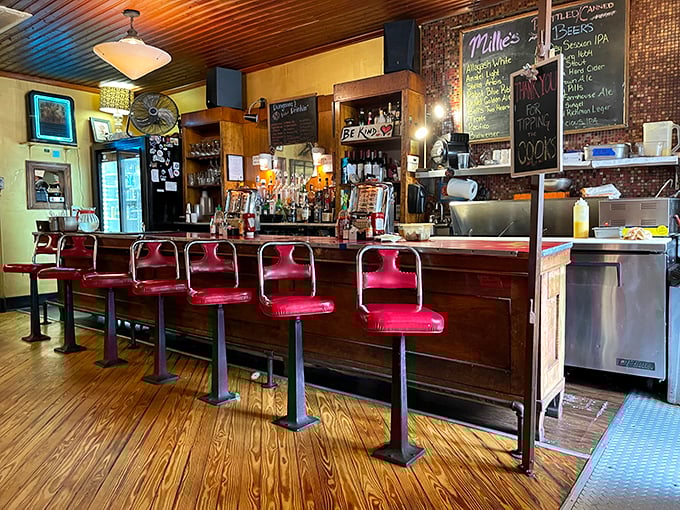 The bar area isn't just for evening imbibing&mdash;it's breakfast central command. Those cherry-red stools have supported the weight of countless Richmond breakfast enthusiasts.