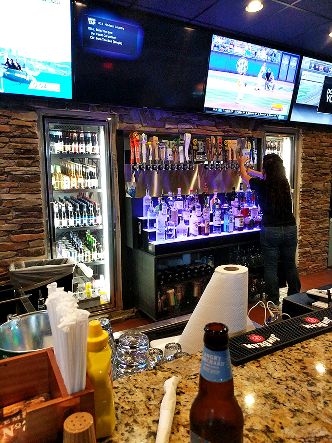 Bottoms up! This bar is stocked fuller than a kid's Christmas stocking, ready to quench any thirst that comes its way.