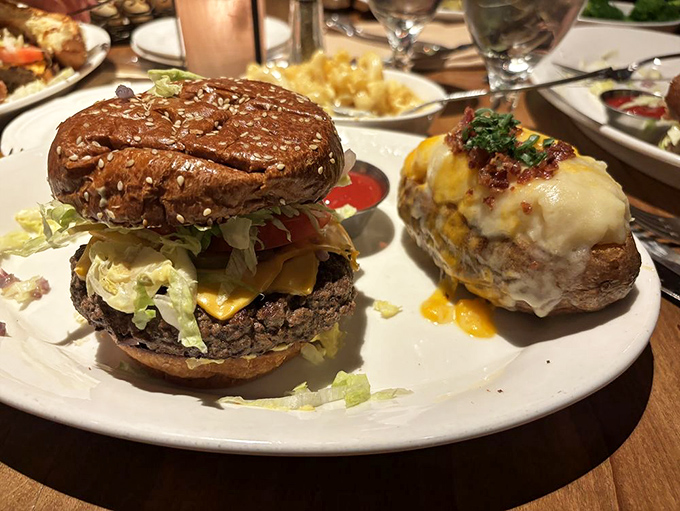 The burger that launched a thousand food pilgrimages, alongside a twice-baked potato that deserves its own fan club.