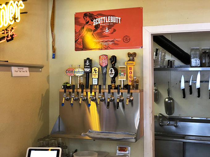 A row of beer taps standing at attention, ready to provide the perfect foil to all that glorious smoked meat.