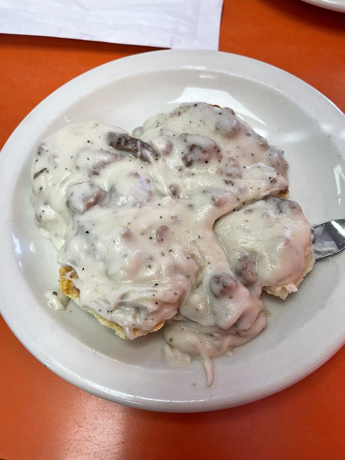 Southern comfort defined: biscuits swimming in peppery cream gravy. Not health food, but definitely soul food that hugs you from the inside out.