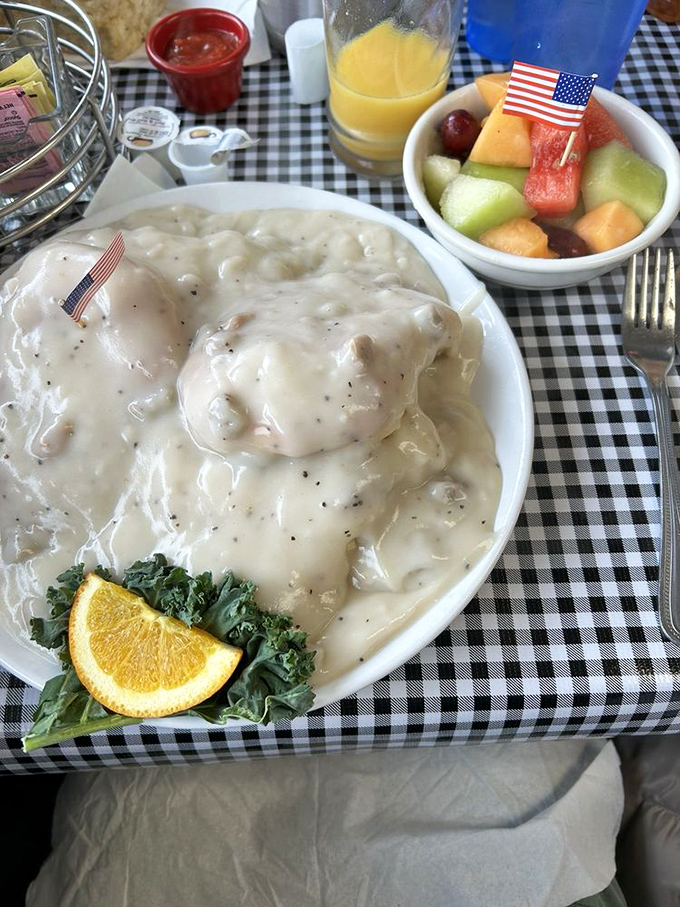 Biscuits swimming in creamy gravy with a fruit bowl chaperone. It's the perfect balance between indulgence and "at least I had some fruit."