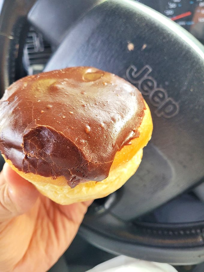 The chocolate glazed&mdash;wearing its frosting like a bespoke suit. That crackling top layer is more satisfying than bubble wrap and twice as addictive.