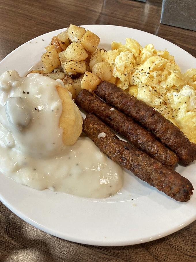 Breakfast that answers the eternal question: "Why choose between biscuits and gravy, eggs, or sausage?" with a resounding "Yes!"