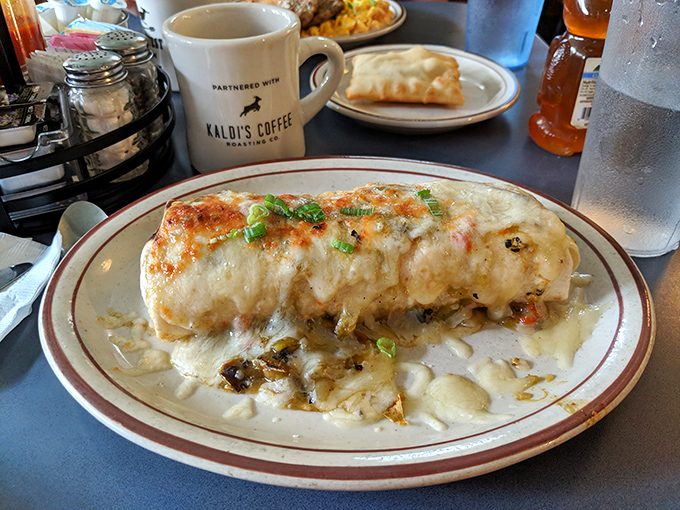 This isn't just a breakfast burrito&mdash;it's architecture, engineering, and art rolled into one cheese-blanketed package of morning perfection.