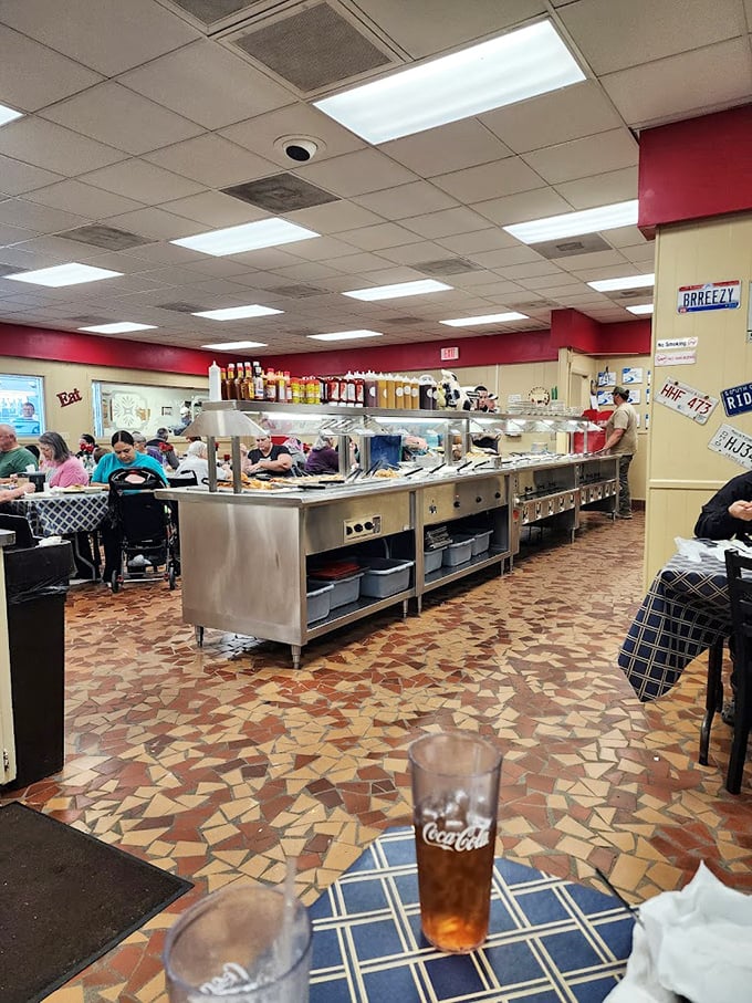 The buffet line at Shealy's stretches like a highway of Southern comfort. Each steam tray holds decades of culinary tradition and family recipes.