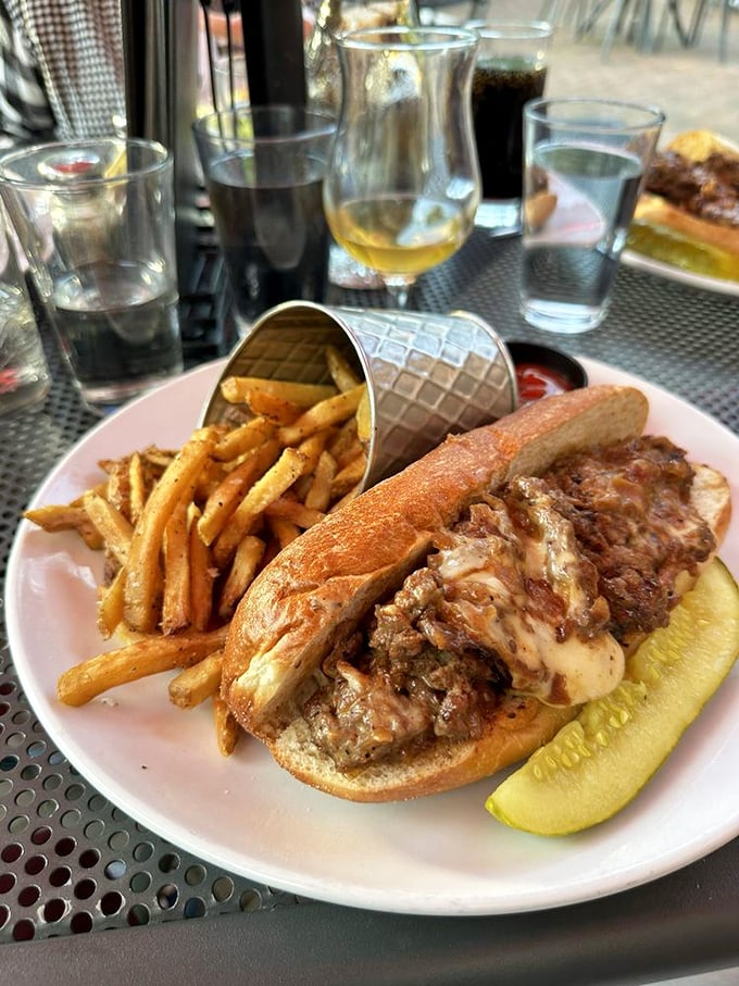 A sandwich that requires both hands and your full attention. Those fries aren't just a side&mdash;they're co-stars in this delicious production.