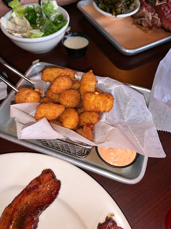 Fried cheese curds that crunch then stretch&mdash;little golden nuggets of joy that somehow make waiting for brisket bearable.