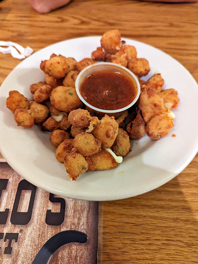 These aren't just cheese curds&mdash;they're golden nuggets of joy. Crispy outside, gooey inside, they're the perfect opening act before the main event steak takes center stage.