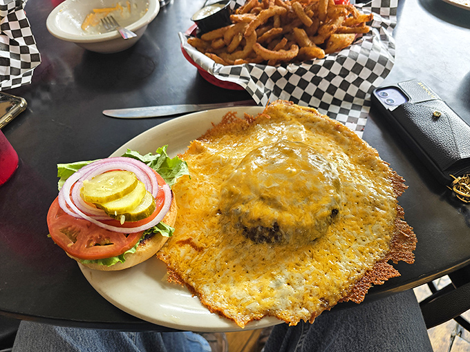 This isn't just a cheeseburger&mdash;it's a golden-crowned masterpiece with cheese melted to perfection and fresh veggies standing by for the crunch factor.
