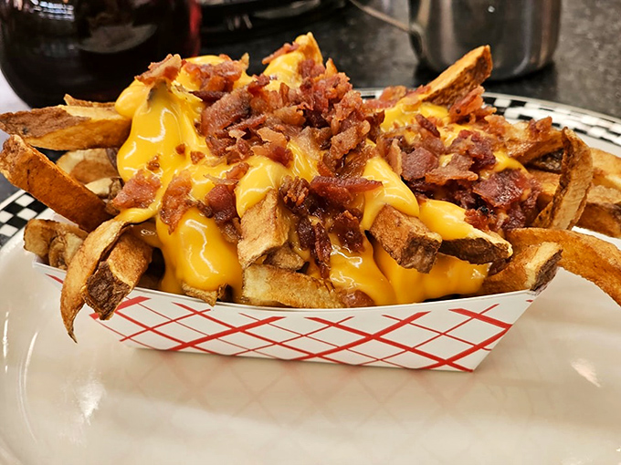 These cheese fries aren't just a side&mdash;they're a commitment. A beautiful, messy, bacon-topped commitment that you'll think about long after the plate is empty.
