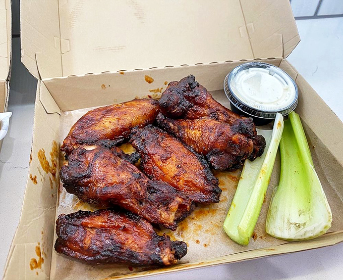 These aren't just wings&mdash;they're smoke-kissed flavor bombs that make you wonder why chickens don't just voluntarily fly into barbecue joints.