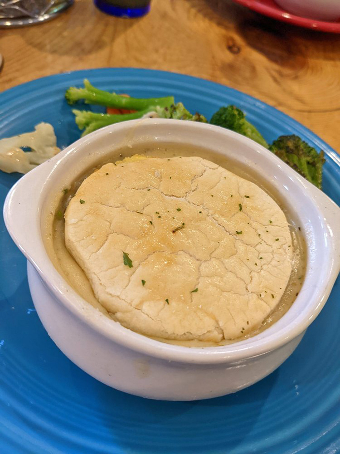 This chicken pot pie isn't hiding under its crust&mdash;it's proudly displaying the perfect golden dome that promises comfort in every spoonful.