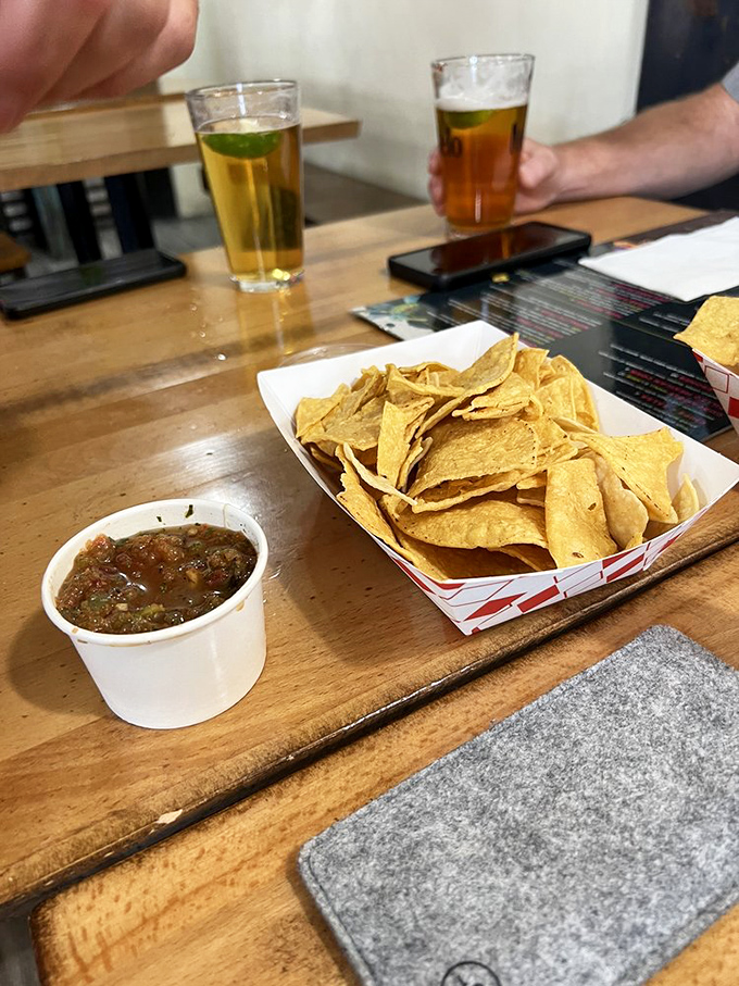 The turquoise trim and vibrant murals make this building pop against the Vegas landscape like a technicolor dream in a black-and-white movie.