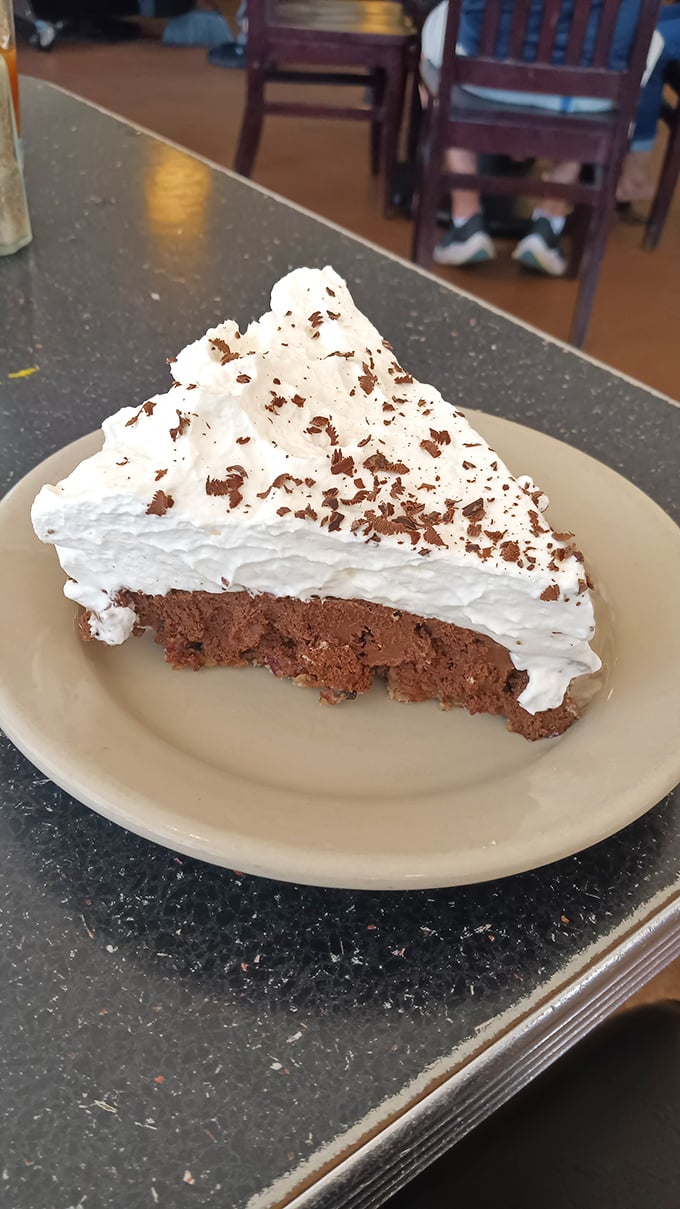 Chocolate pie with a cloud of whipped cream so perfect it belongs in the dessert hall of fame. Fork not included&mdash;you'll want to dive right in.